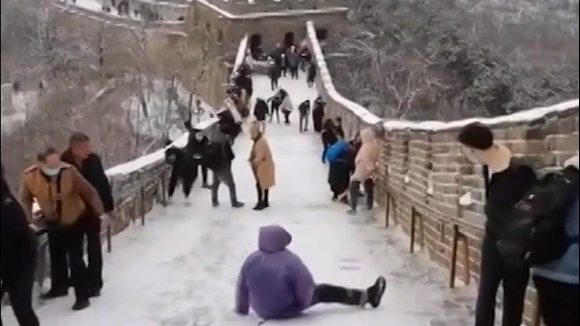 Tourist slides down Great Wall of China amid icy conditions | kare11.com