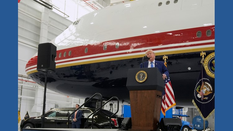 President Donald Trump unveils the new Air Force One, a converted ...