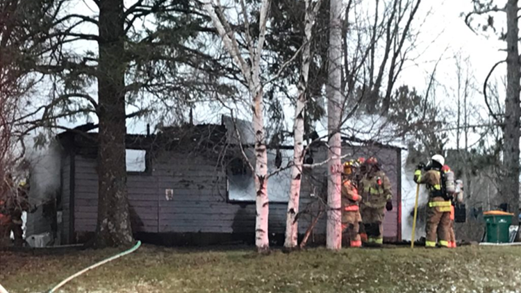 Off-duty firefighter pulls two men out of burning home in Rice Lake ...