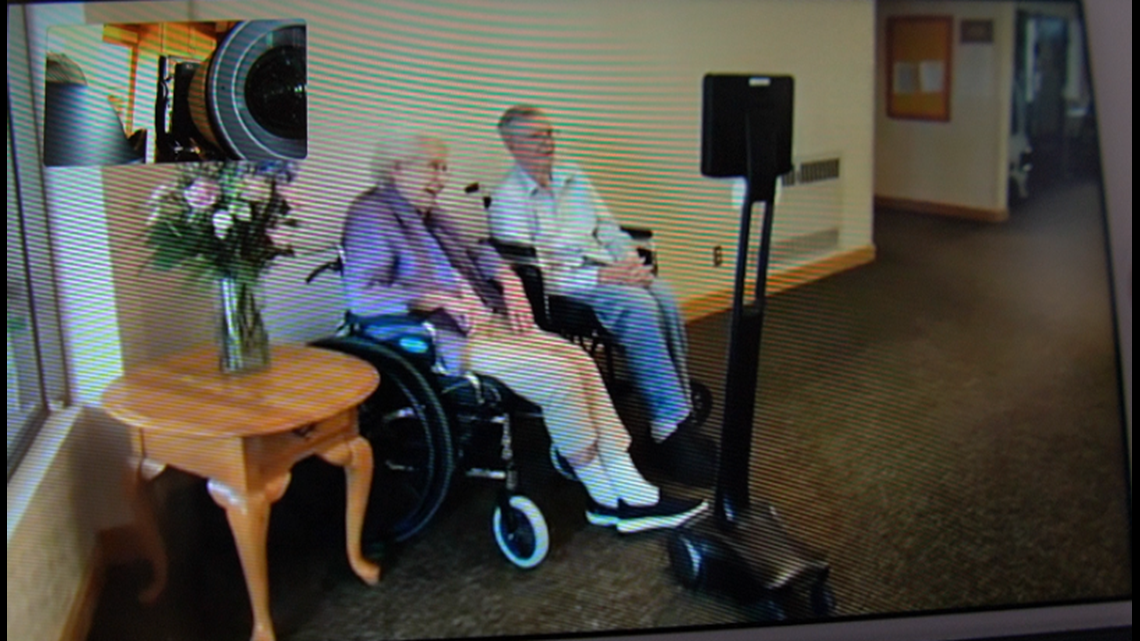 Nursing home uses robot to video chat family members of residents ...