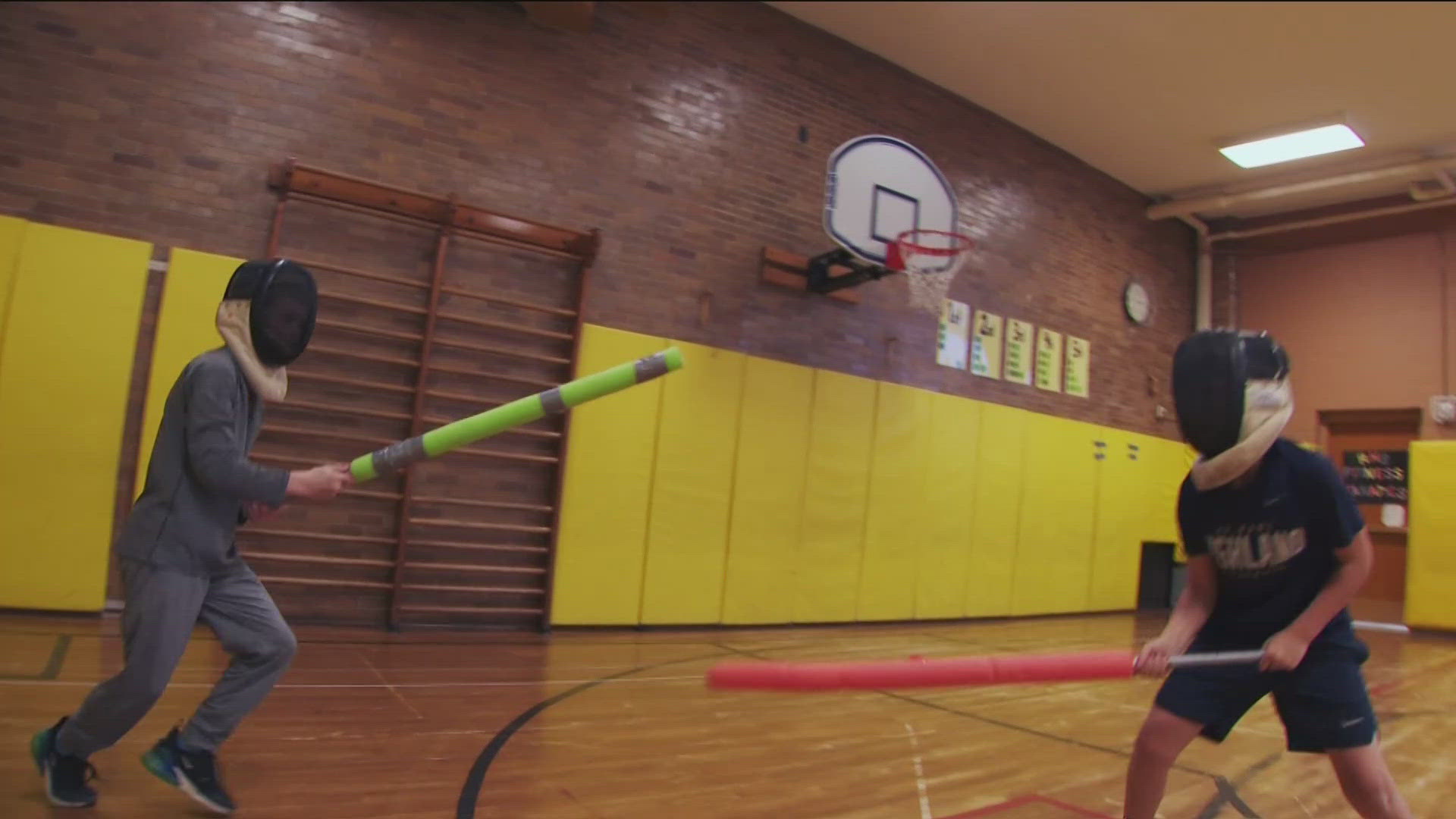 Randolph Heights students learn with lightsaber fencing | kare11.com