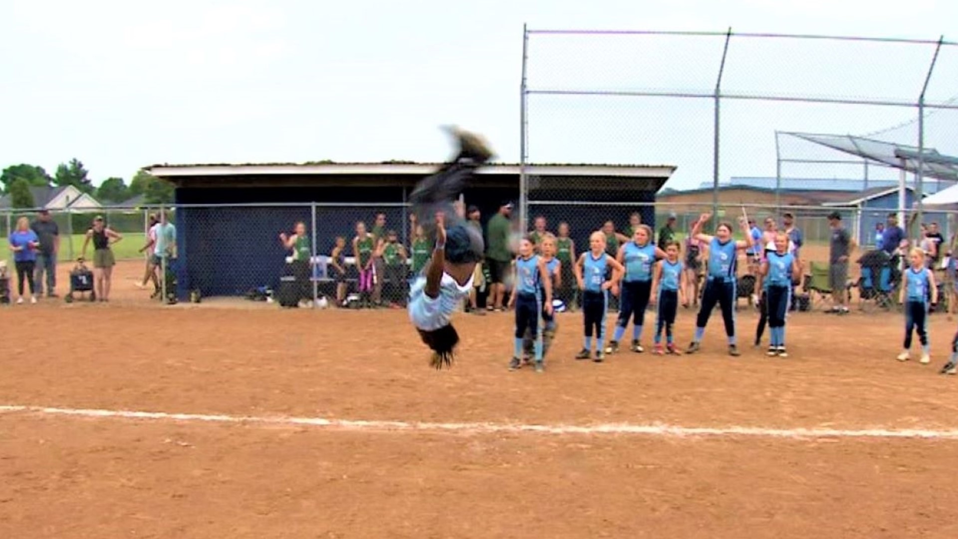 Cheerleading, backflipping ump talk of Minnesota youth softball ...