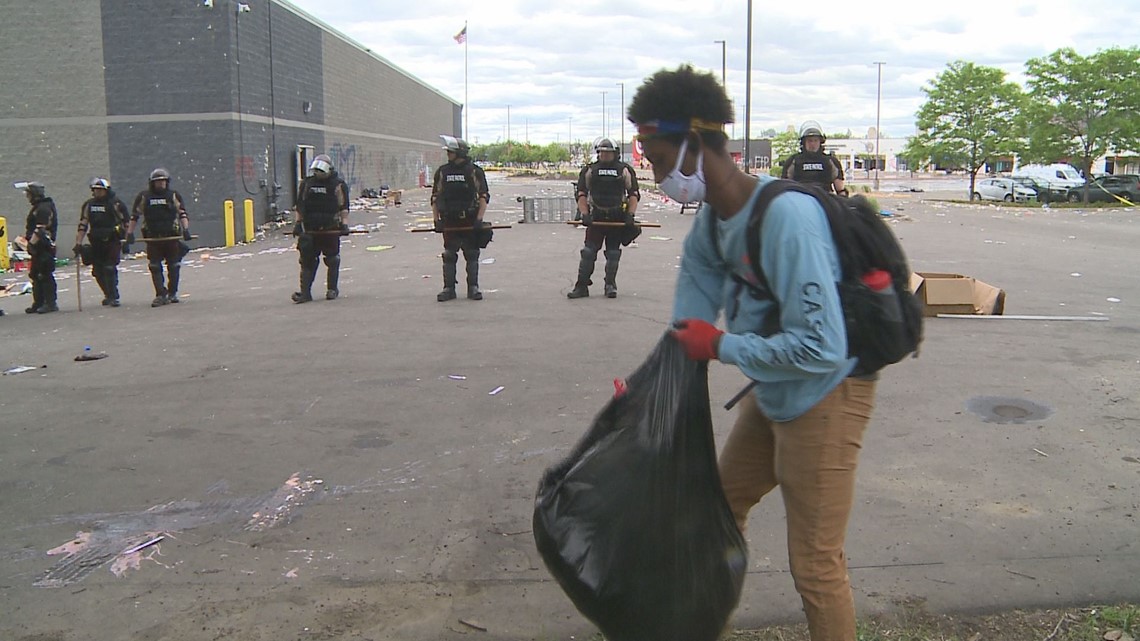 Minneapolis community members clean up after damaging night | kare11.com