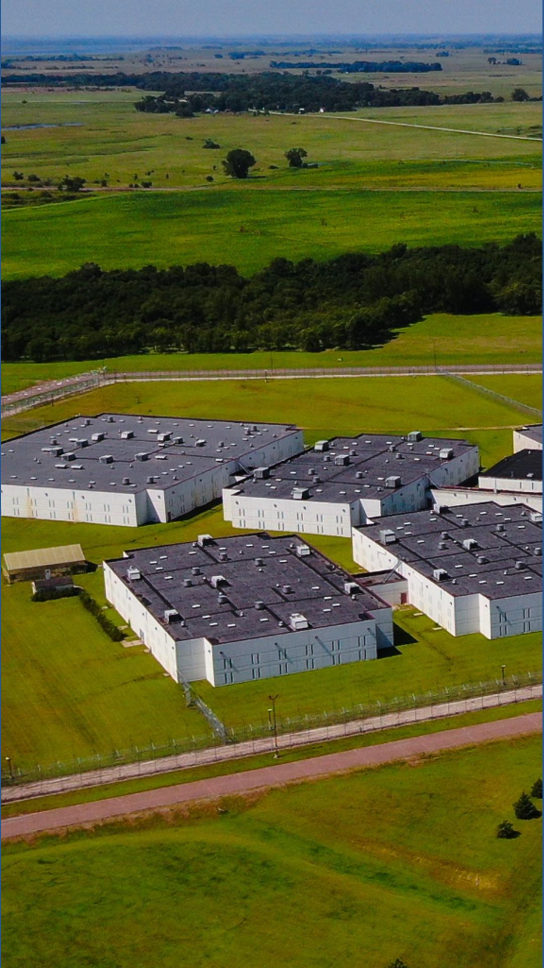 Community pushes back against plans to reopen prison as ICE detention ...