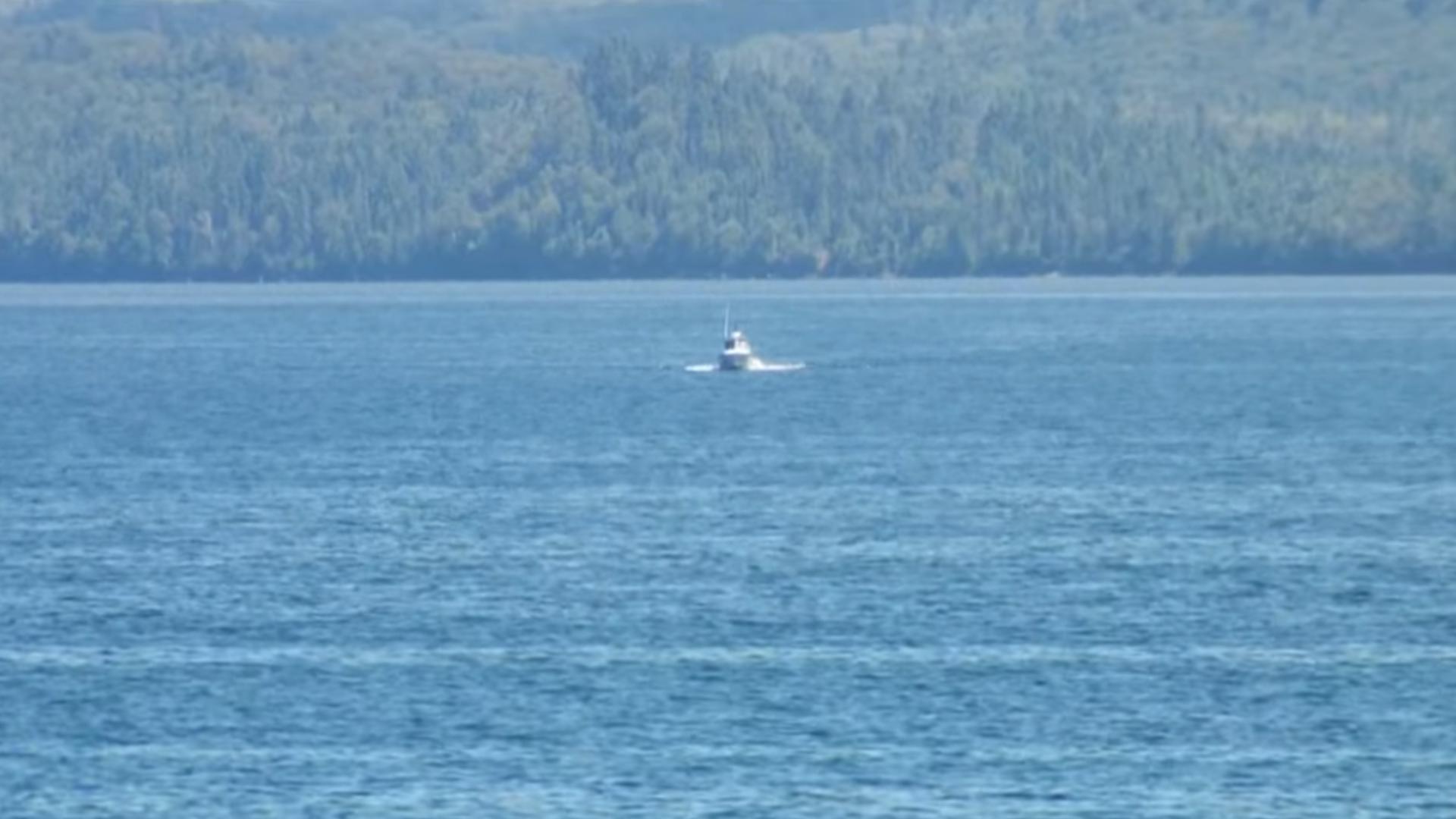 Man survives two-mile swim to safety after falling into Lake Superior ...