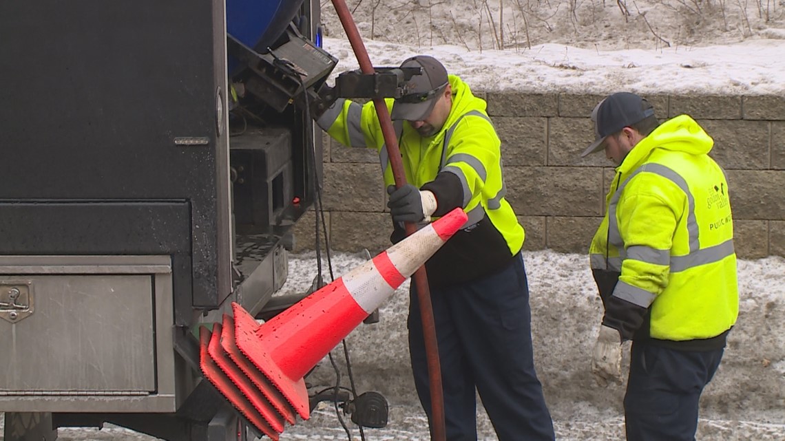 With rain on the way, city crews are clearing out frozen storm drains ...