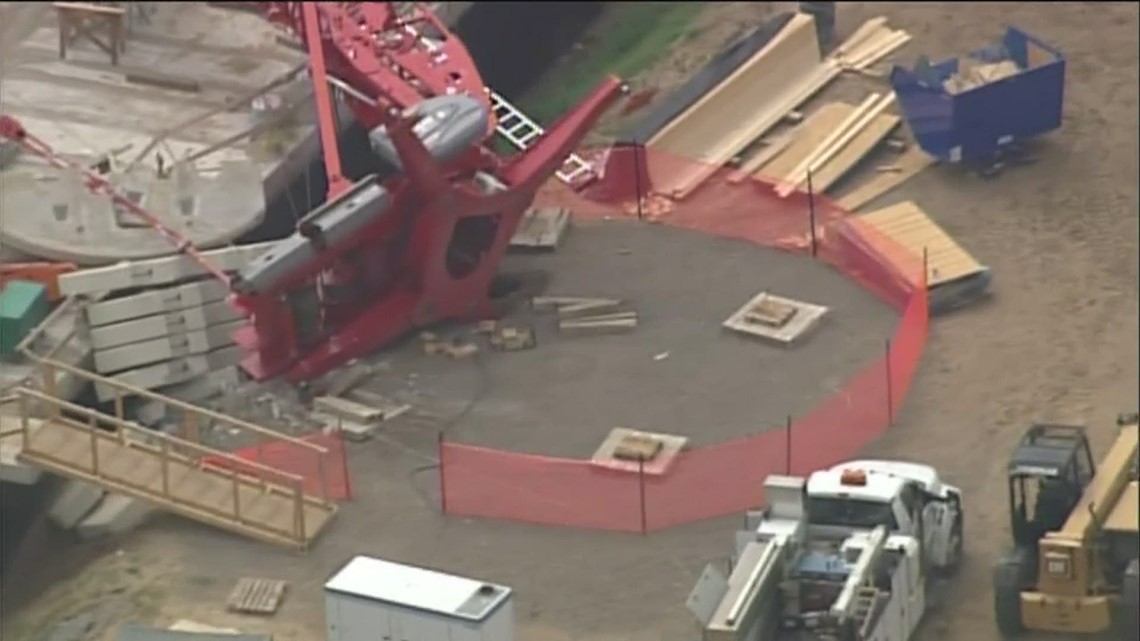 Crane collapse damages building under construction, knocks out power ...