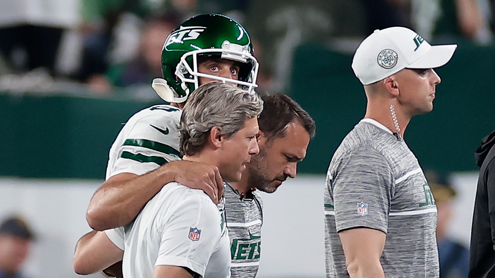 Rodgers carted from sideline after suffering apparent leg injury ...